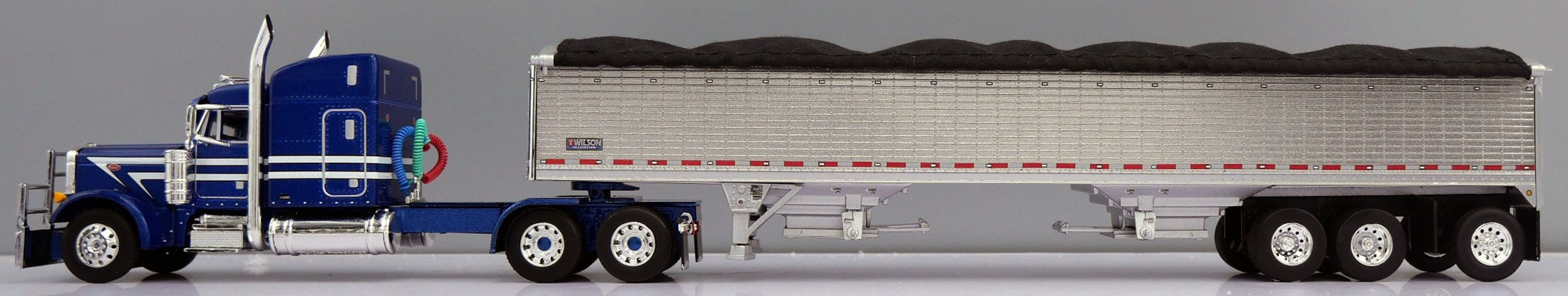 #60-2025 Blue Peterbilt 379 with Tri Axle Grain Trailer – JW Toy Trucks