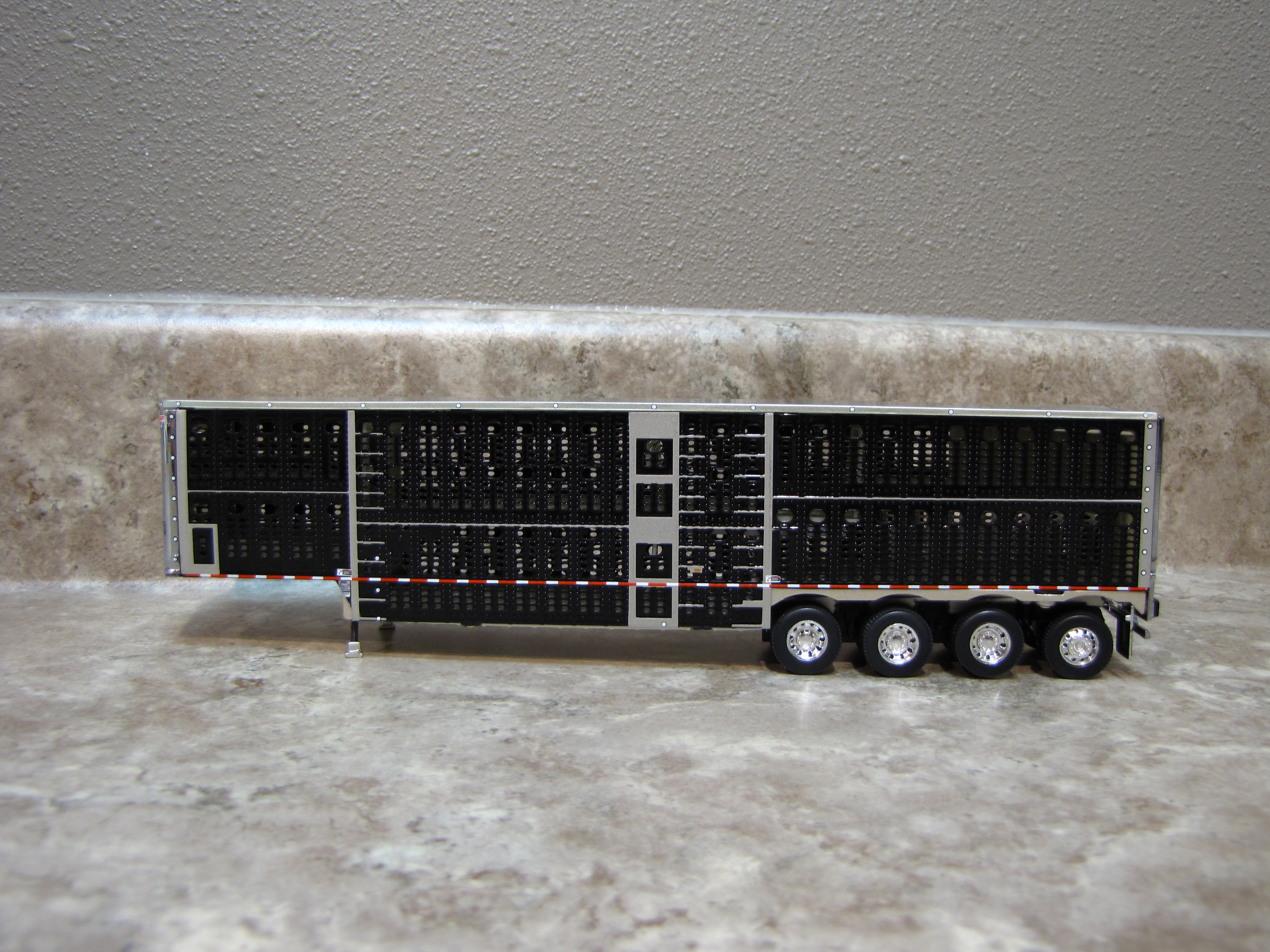 TRL 1101 Black Wilson Quad Axle Livestock Trailer – JW Toy Trucks