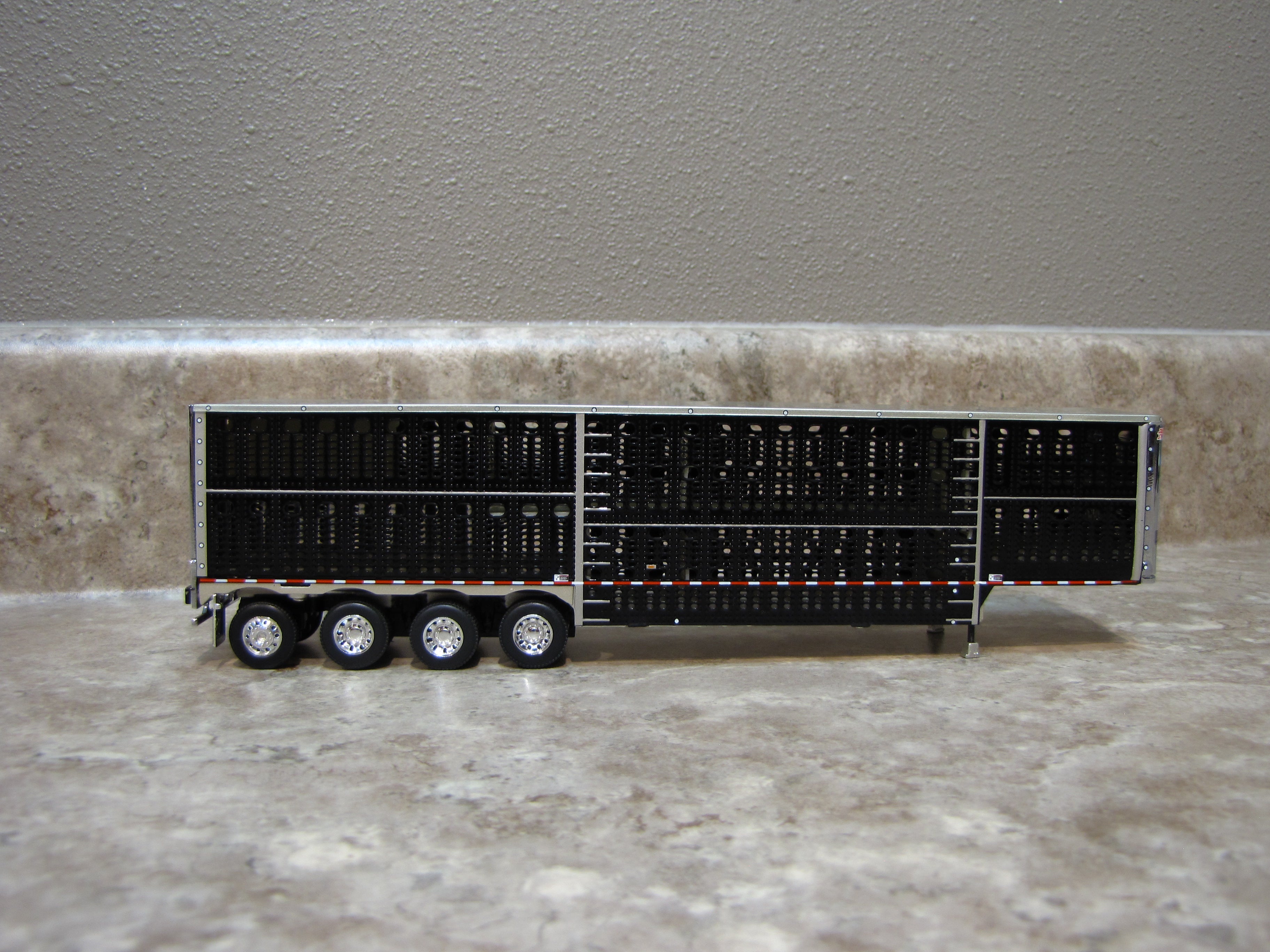 TRL 1101 Black Wilson Quad Axle Livestock Trailer – JW Toy Trucks